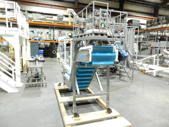 Used blue belt incline conveyor for transferring bulk product for sale. - High Performance Packaging
