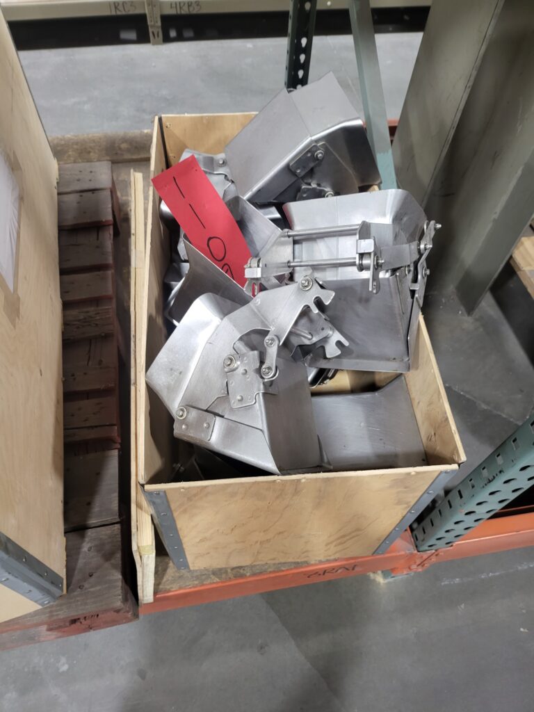 Nine totes of Ishida and Yamato scale parts.
